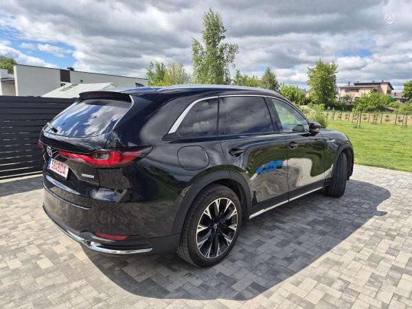 Black Mazda CX-90 2024 in Vilnius, with an engine capacity of 2.49 L and mileage of 20 thousand km for 46000 €, photo 5 on AUTOMOTO.COM.LV