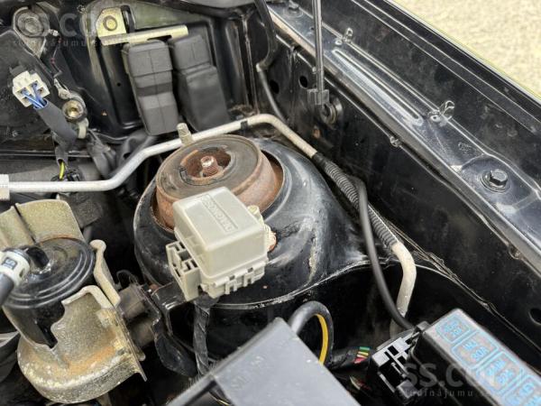 Black Mazda Demio 1999 in Riga, with an engine capacity of 1.40 L and mileage of 170 thousand km for 1650 €, photo 6 on AUTOMOTO.COM.LV