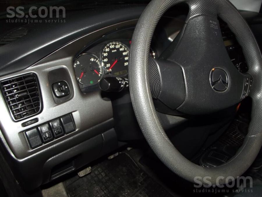 Black Mazda MPV 2004 in Riga, with an engine capacity of 2.00 L and mileage of 294 thousand km for 550 €, photo 7 on AUTOMOTO.COM.LV