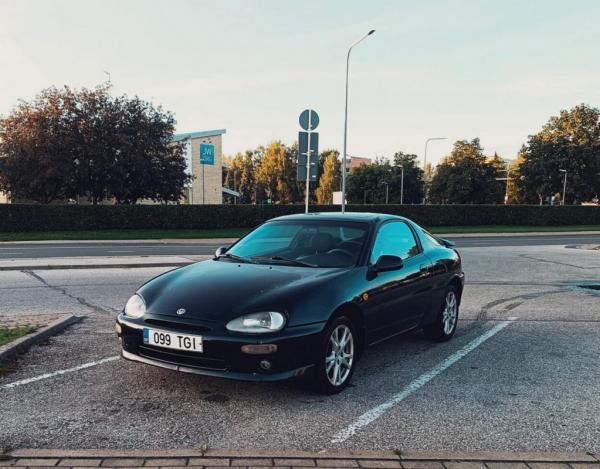 Blue Mazda MX-3 1995 in Tallinn, with an engine capacity of 1.80 L and mileage of 262 thousand km for 1500 €, photo 1 on AUTOMOTO.COM.LV
