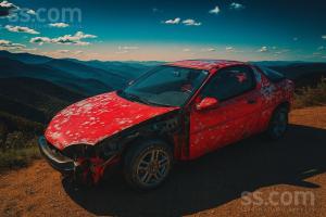 Red Mazda MX-3 1997 in Riga, with an engine capacity of 1.60 L and mileage of 246 thousand km for 350 €, photo 8 on AUTOMOTO.COM.LV