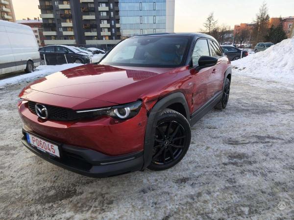 Red Mazda MX-30 2022 in Vilnius, with an engine capacity of 0.00 L and mileage of 66 thousand km for 9900 €, photo 1 on AUTOMOTO.COM.LV