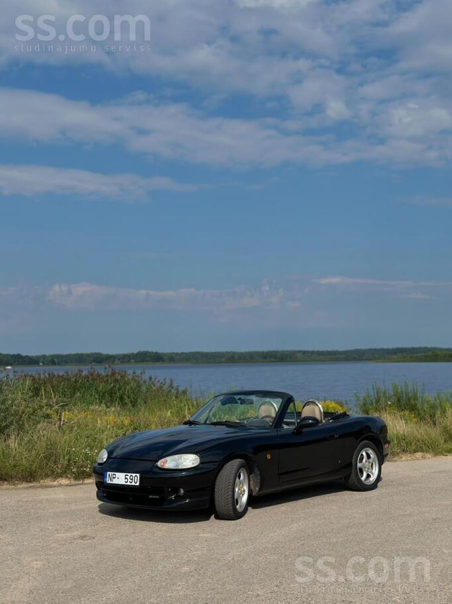 Black Mazda MX-5 2001 in Riga, with an engine capacity of 1.60 L and mileage of 208 thousand km for 4100 €, photo 1 on AUTOMOTO.COM.LV