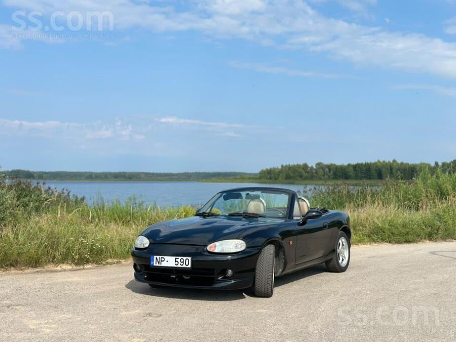 Black Mazda MX-5 2001 in Riga, with an engine capacity of 1.60 L and mileage of 208 thousand km for 4100 €, photo 3 on AUTOMOTO.COM.LV