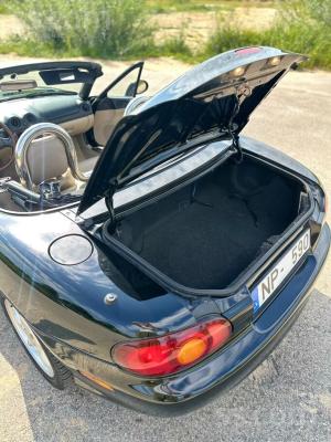 Black Mazda MX-5 2001 in Riga, with an engine capacity of 1.60 L and mileage of 208 thousand km for 4100 €, photo 5 on AUTOMOTO.COM.LV
