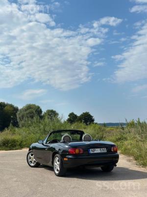 Black Mazda MX-5 2001 in Riga, with an engine capacity of 1.60 L and mileage of 208 thousand km for 4100 €, photo 8 on AUTOMOTO.COM.LV