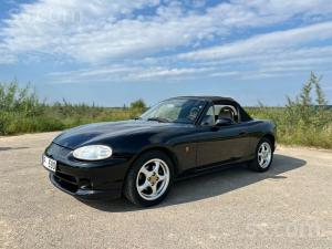 Black Mazda MX-5 2001 in Riga, with an engine capacity of 1.60 L and mileage of 208 thousand km for 4100 €, photo 9 on AUTOMOTO.COM.LV
