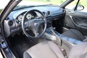 Melns Mazda MX-5 2002 Rīga, ar dzinēja tilpumu 1.60 L un nobraukumu 164 tūkst. km par 4250 €, foto 21 vietnē AUTOMOTO.COM.LV