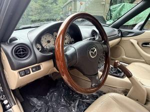 Black Mazda MX-5 2003 in Vilnius, with an engine capacity of 1.60 L and mileage of 159 thousand km for 4300 €, photo 15 on AUTOMOTO.COM.LV