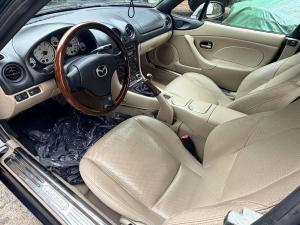 Black Mazda MX-5 2003 in Vilnius, with an engine capacity of 1.60 L and mileage of 159 thousand km for 4300 €, photo 16 on AUTOMOTO.COM.LV
