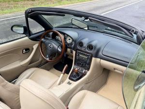 Black Mazda MX-5 2003 in Vilnius, with an engine capacity of 1.60 L and mileage of 159 thousand km for 4300 €, photo 18 on AUTOMOTO.COM.LV