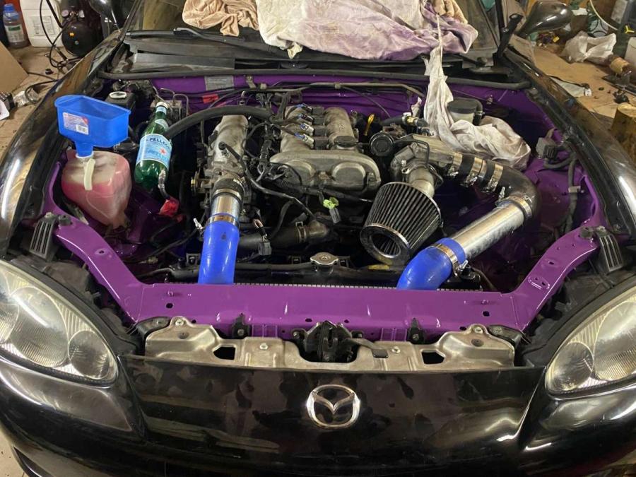 Black Mazda MX-5 2003 in Vilnius, with an engine capacity of 1.60 L and mileage of 180 thousand km for 4499 €, photo 22 on AUTOMOTO.COM.LV