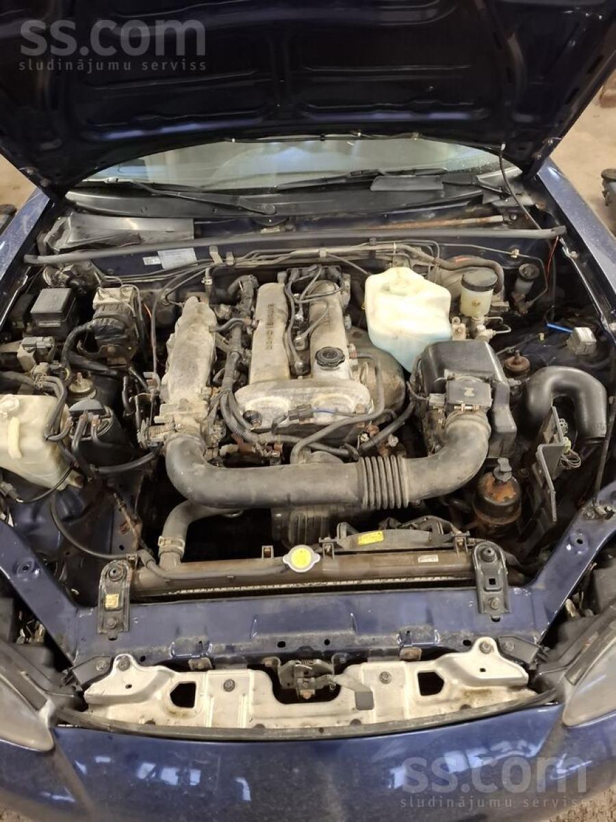 Blue Mazda MX-5 2000 in Gulbene, with an engine capacity of 1.60 L and mileage of 264 thousand km for 4995 €, photo 6 on AUTOMOTO.COM.LV