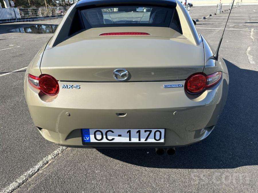 Brown Mazda MX-5 2023 in Riga, with an engine capacity of 2.00 L and mileage of 16 thousand km for 31900 €, photo 18 on AUTOMOTO.COM.LV