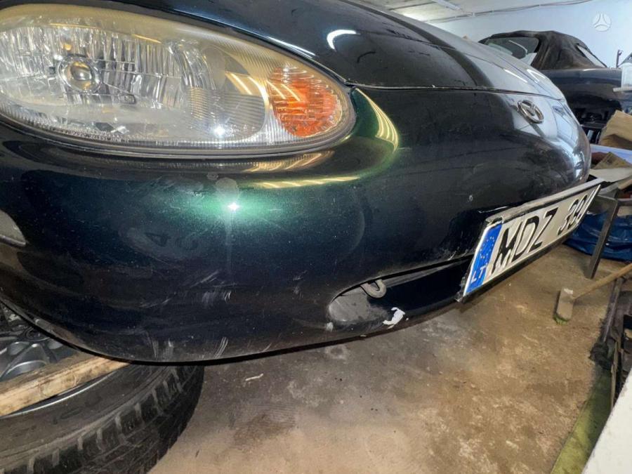 Green Mazda MX-5 2000 in Vilnius, with an engine capacity of 1.60 L and mileage of 151 thousand km for 2500 €, photo 7 on AUTOMOTO.COM.LV