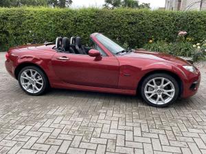 Red Mazda MX-5 2014 in Taurage, with an engine capacity of 2.00 L and mileage of 202 thousand km for 6900 €, photo 6 on AUTOMOTO.COM.LV