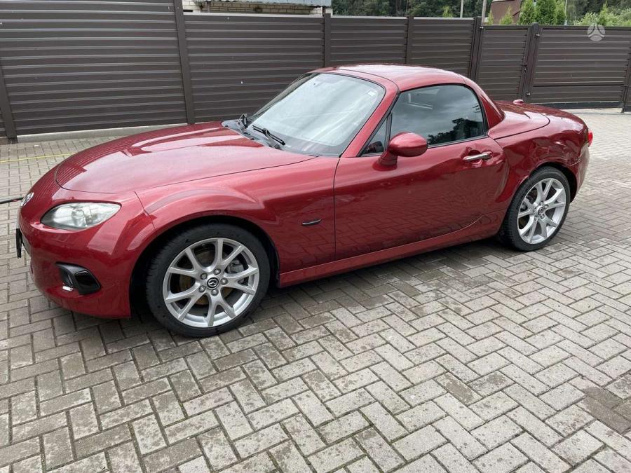 Red Mazda MX-5 2014 in Taurage, with an engine capacity of 2.00 L and mileage of 202 thousand km for 6900 €, photo 21 on AUTOMOTO.COM.LV