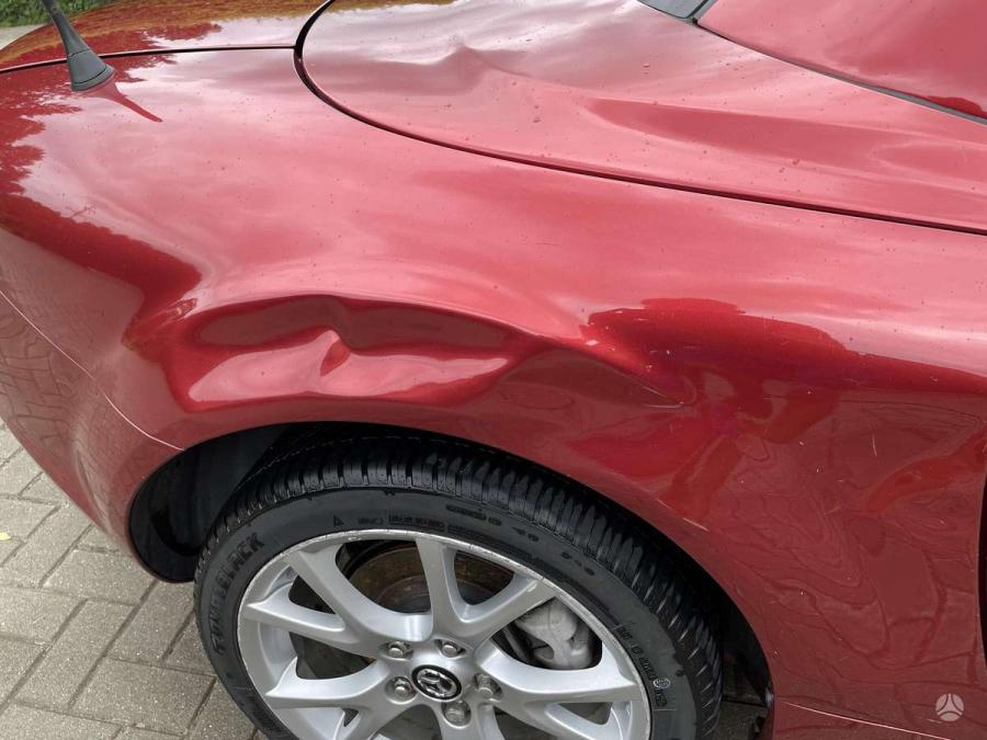Red Mazda MX-5 2014 in Taurage, with an engine capacity of 2.00 L and mileage of 202 thousand km for 6900 €, photo 30 on AUTOMOTO.COM.LV