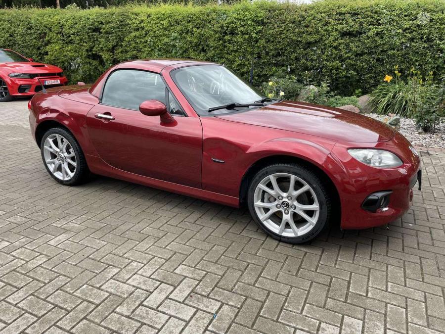 Red Mazda MX-5 2014 in Taurage, with an engine capacity of 2.00 L and mileage of 202 thousand km for 6900 €, photo 35 on AUTOMOTO.COM.LV