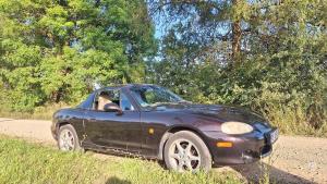 Violet Mazda MX-5 2003 in Vilnius, with an engine capacity of 1.60 L and mileage of 310 thousand km for 2900 €, photo 3 on AUTOMOTO.COM.LV