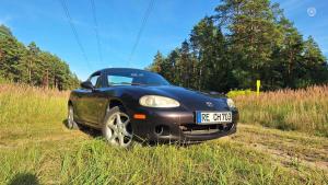 Violet Mazda MX-5 2003 in Vilnius, with an engine capacity of 1.60 L and mileage of 310 thousand km for 2900 €, photo 5 on AUTOMOTO.COM.LV