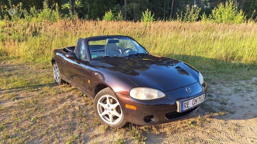 Violet Mazda MX-5 2003 in Vilnius, with an engine capacity of 1.60 L and mileage of 310 thousand km for 2900 €, photo 6 on AUTOMOTO.COM.LV