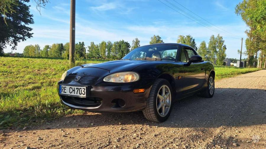 Violet Mazda MX-5 2003 in Vilnius, with an engine capacity of 1.60 L and mileage of 310 thousand km for 2900 €, photo 11 on AUTOMOTO.COM.LV