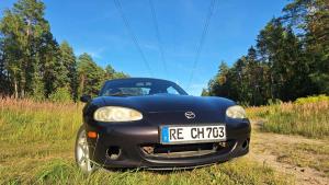 Violet Mazda MX-5 2003 in Vilnius, with an engine capacity of 1.60 L and mileage of 310 thousand km for 2900 €, photo 12 on AUTOMOTO.COM.LV