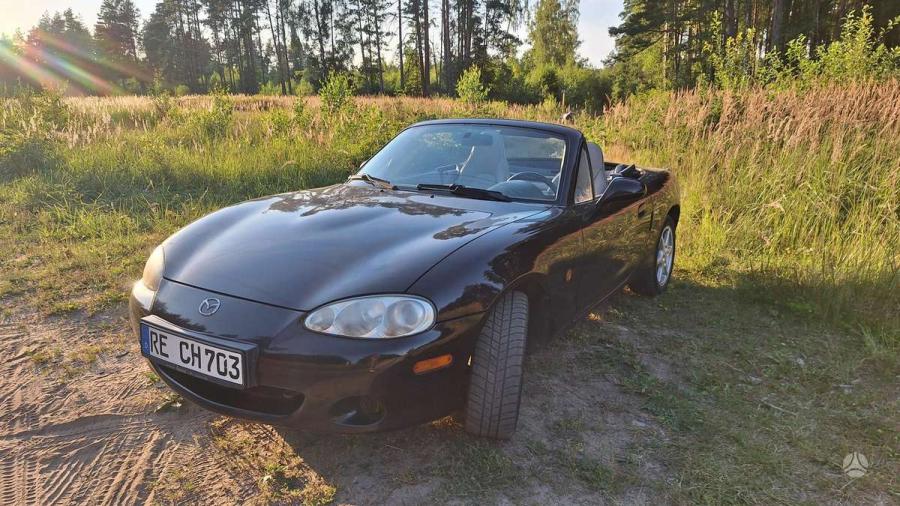 Violet Mazda MX-5 2003 in Vilnius, with an engine capacity of 1.60 L and mileage of 310 thousand km for 2900 €, photo 13 on AUTOMOTO.COM.LV