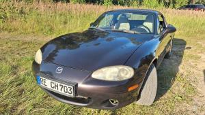Violet Mazda MX-5 2003 in Vilnius, with an engine capacity of 1.60 L and mileage of 310 thousand km for 2900 €, photo 14 on AUTOMOTO.COM.LV