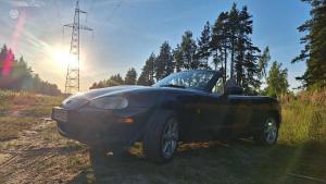 Violet Mazda MX-5 2003 in Vilnius, with an engine capacity of 1.60 L and mileage of 310 thousand km for 2900 €, photo 18 on AUTOMOTO.COM.LV