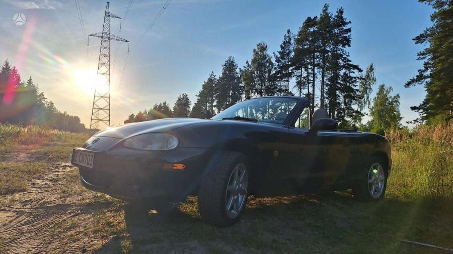 Violet Mazda MX-5 2003 in Vilnius, with an engine capacity of 1.60 L and mileage of 310 thousand km for 2900 €, photo 18 on AUTOMOTO.COM.LV