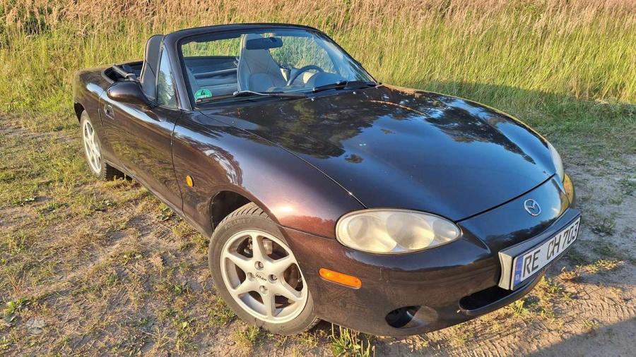 Violet Mazda MX-5 2003 in Vilnius, with an engine capacity of 1.60 L and mileage of 310 thousand km for 2900 €, photo 21 on AUTOMOTO.COM.LV