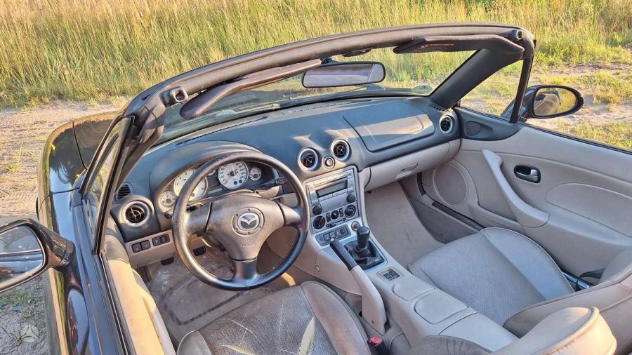 Violet Mazda MX-5 2003 in Vilnius, with an engine capacity of 1.60 L and mileage of 310 thousand km for 2900 €, photo 24 on AUTOMOTO.COM.LV