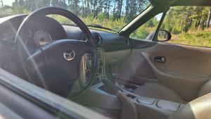 Violet Mazda MX-5 2003 in Vilnius, with an engine capacity of 1.60 L and mileage of 310 thousand km for 2900 €, photo 26 on AUTOMOTO.COM.LV