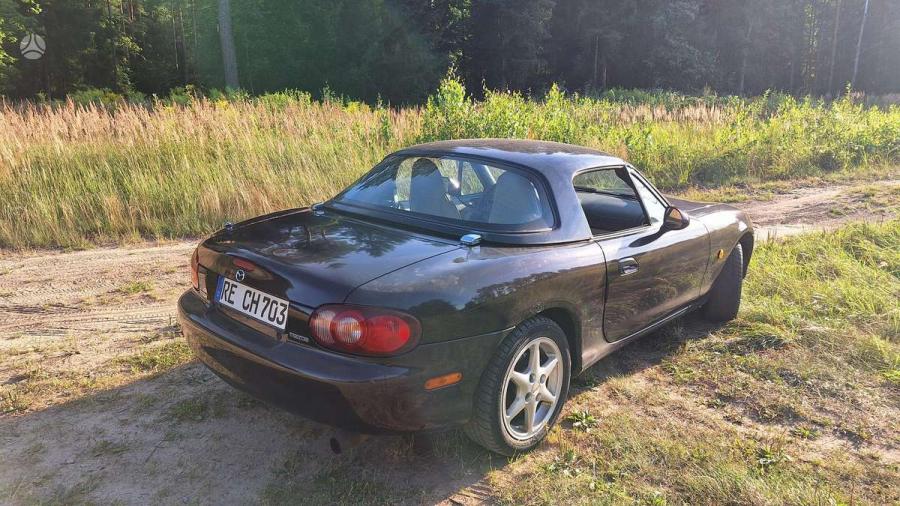 Violet Mazda MX-5 2003 in Vilnius, with an engine capacity of 1.60 L and mileage of 310 thousand km for 2900 €, photo 29 on AUTOMOTO.COM.LV