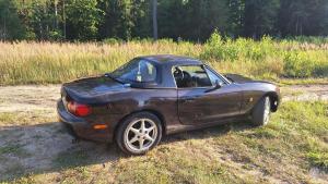 Violet Mazda MX-5 2003 in Vilnius, with an engine capacity of 1.60 L and mileage of 310 thousand km for 2900 €, photo 30 on AUTOMOTO.COM.LV