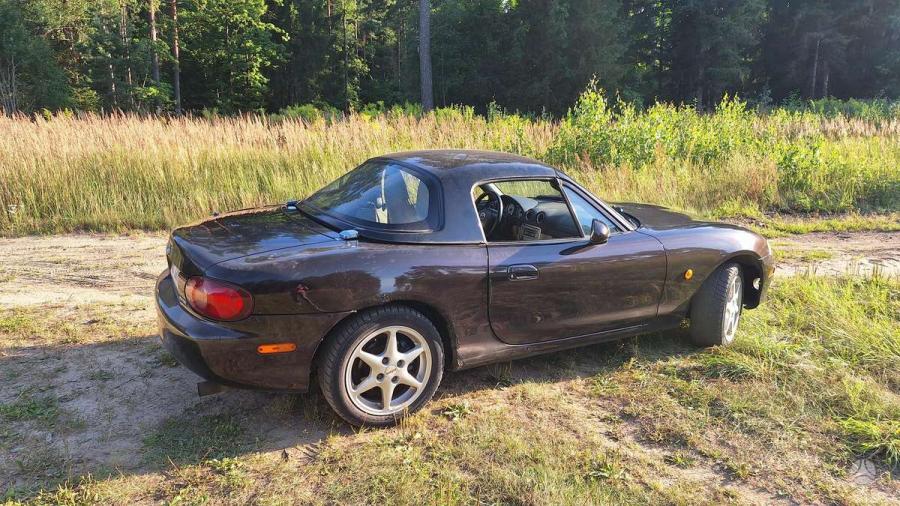 Violet Mazda MX-5 2003 in Vilnius, with an engine capacity of 1.60 L and mileage of 310 thousand km for 2900 €, photo 30 on AUTOMOTO.COM.LV