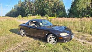 Violet Mazda MX-5 2003 in Vilnius, with an engine capacity of 1.60 L and mileage of 310 thousand km for 2900 €, photo 31 on AUTOMOTO.COM.LV