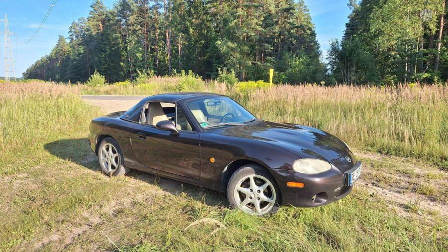Violet Mazda MX-5 2003 in Vilnius, with an engine capacity of 1.60 L and mileage of 310 thousand km for 2900 €, photo 31 on AUTOMOTO.COM.LV
