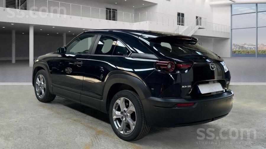 Black Mazda MX 2021 in Riga, with an engine capacity of 0.00 L and mileage of 60 thousand km for 15555 €, photo 5 on AUTOMOTO.COM.LV