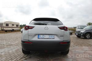 White Mazda MX 2020 in Liepaja, with an engine capacity of 0.00 L and mileage of 52 thousand km for 15000 €, photo 6 on AUTOMOTO.COM.LV