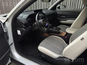 White Mazda MX 2020 in Riga, with an engine capacity of 0.00 L and mileage of 91 thousand km for 15990 €, photo 14 on AUTOMOTO.COM.LV