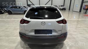 White Mazda MX 2022 in Riga, with an engine capacity of 0.00 L and mileage of 47 thousand km for 16500 €, photo 8 on AUTOMOTO.COM.LV