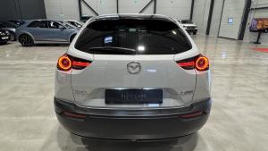 White Mazda MX 2022 in Riga, with an engine capacity of 0.00 L and mileage of 47 thousand km for 16500 €, photo 8 on AUTOMOTO.COM.LV