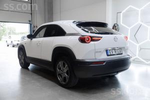 White Mazda MX 2023 in Riga, with an engine capacity of 0.00 L and mileage of 39 thousand km for 17890 €, photo 6 on AUTOMOTO.COM.LV