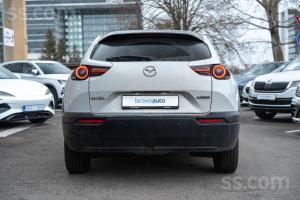 White Mazda MX 2021 in Riga, with an engine capacity of 0.00 L and mileage of 45 thousand km for 12990 €, photo 6 on AUTOMOTO.COM.LV