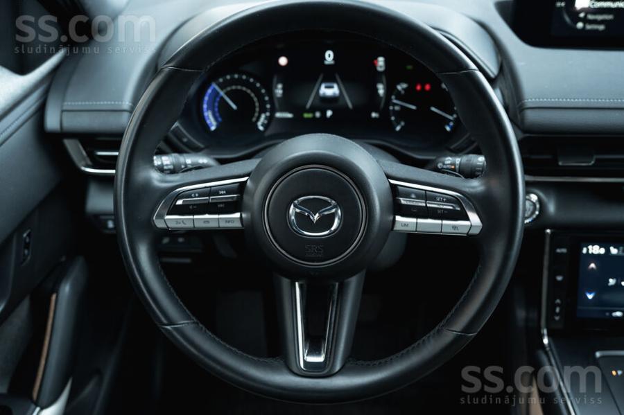 White Mazda MX 2021 in Riga, with an engine capacity of 0.00 L and mileage of 45 thousand km for 12990 €, photo 15 on AUTOMOTO.COM.LV
