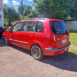 Red Mazda Premacy 1999 in Riga, with an engine capacity of 1.80 L and mileage of 202 thousand km for 699 €, photo 5 on AUTOMOTO.COM.LV