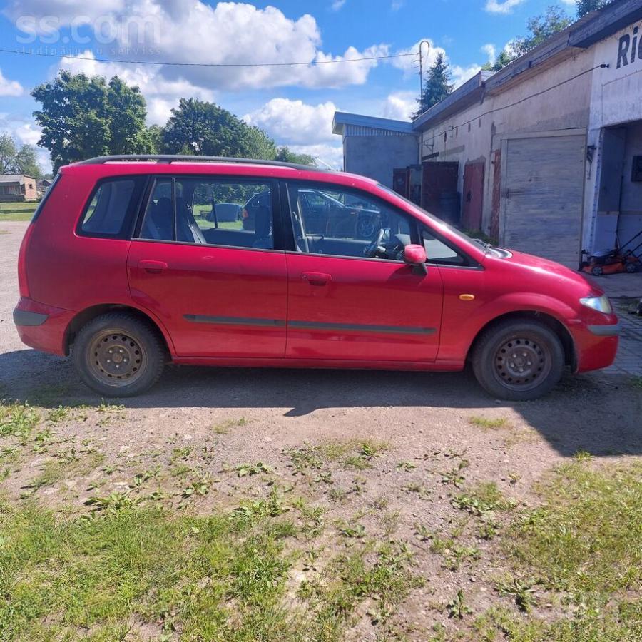 Red Mazda Premacy 1999 in Riga, with an engine capacity of 1.80 L and mileage of 202 thousand km for 699 €, photo 7 on AUTOMOTO.COM.LV